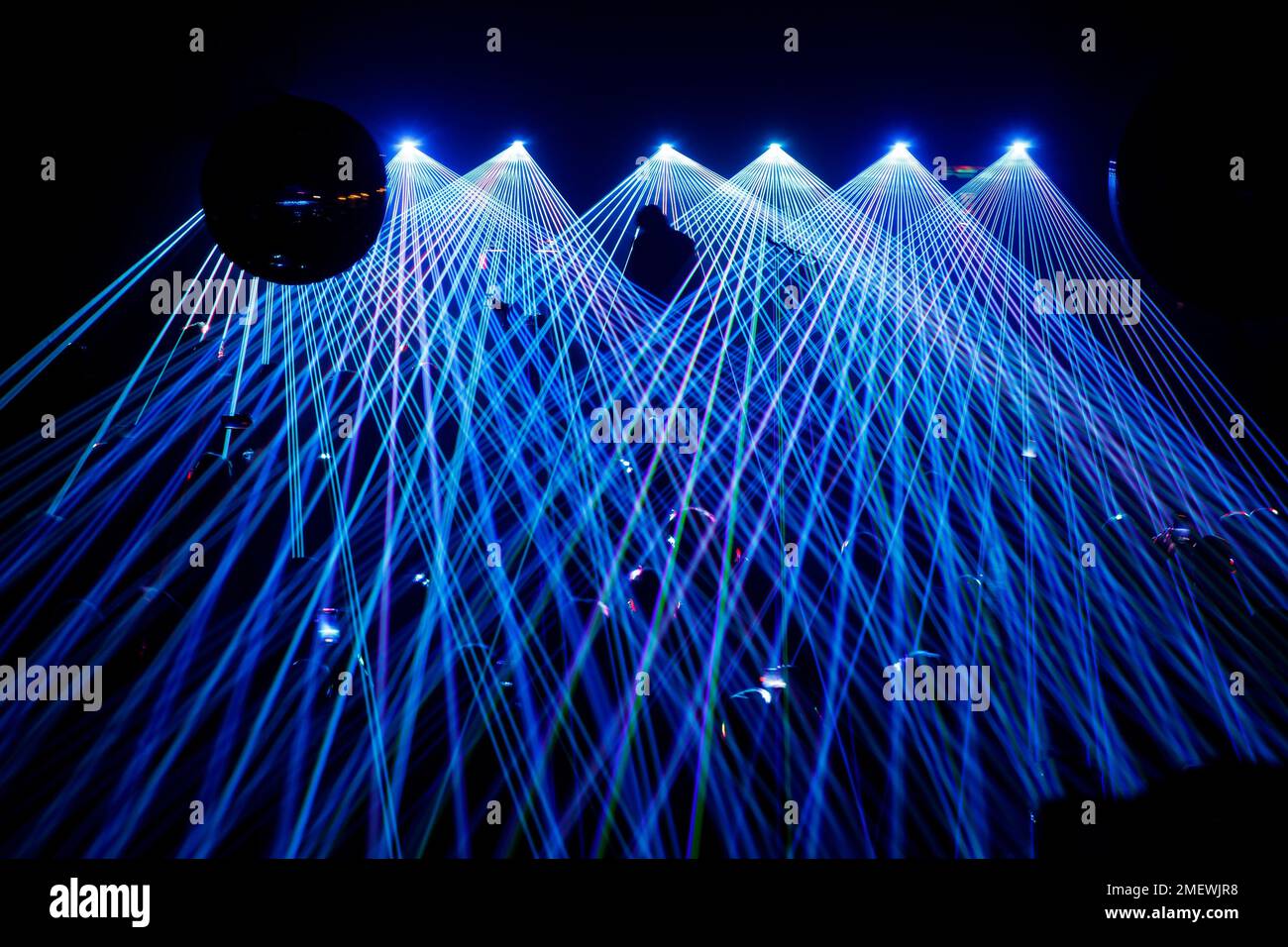 Amazing light laser show on the event party Stock Photo - Alamy