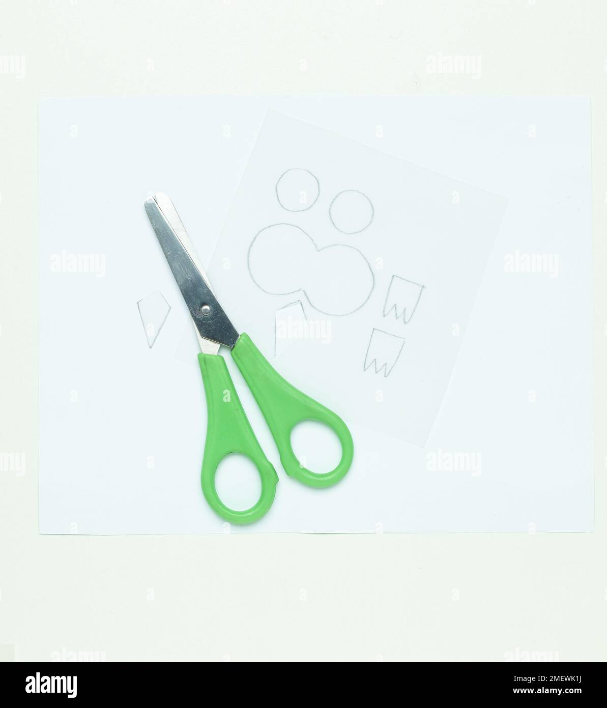 Cutting out templates for owl's eyes, beak and feet Stock Photo - Alamy