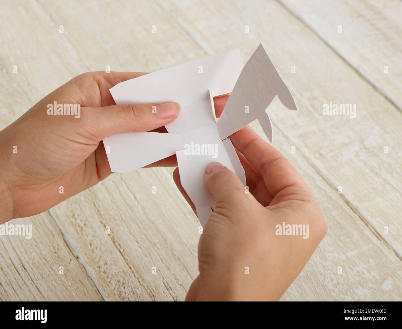 Folding paper puppets hi-res stock photography and images - Alamy