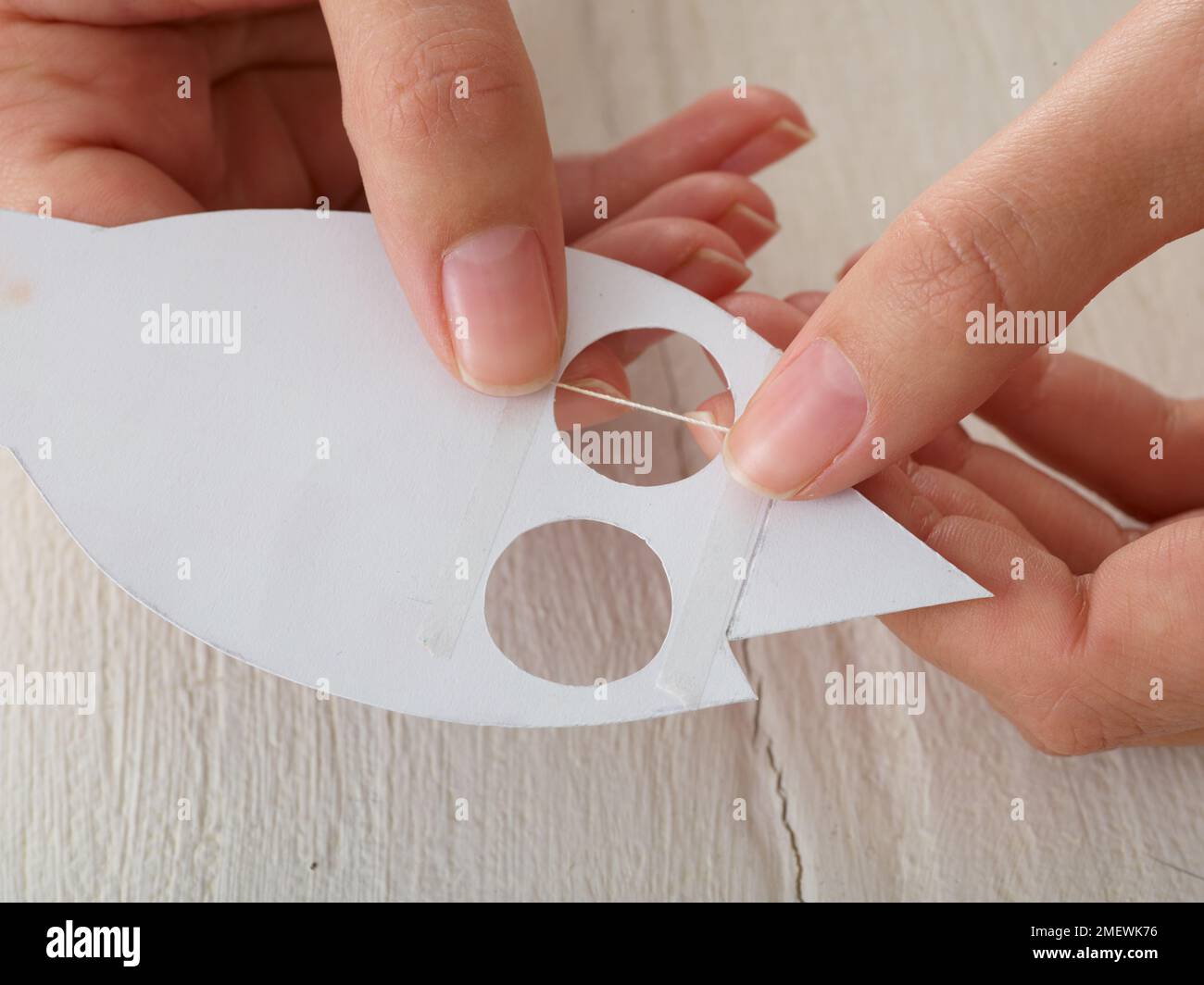 Paper Craft. DIY Paper Mobile Step 8 Stock Photo - Alamy