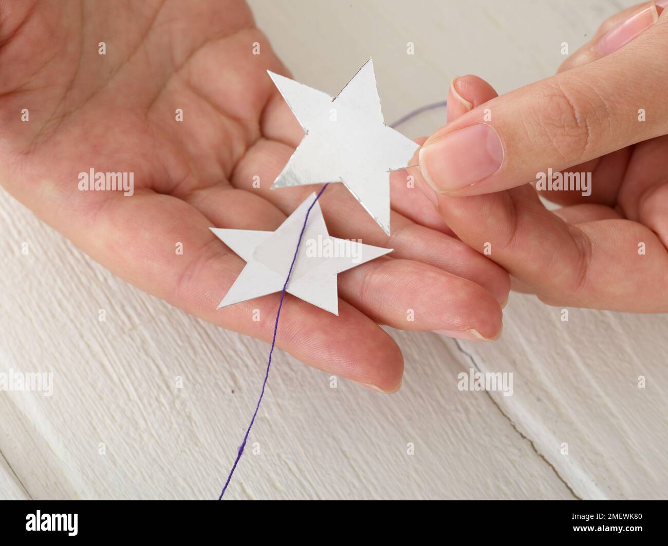 Paper Craft. DIY Paper Mobile Step 15 Stock Photo - Alamy
