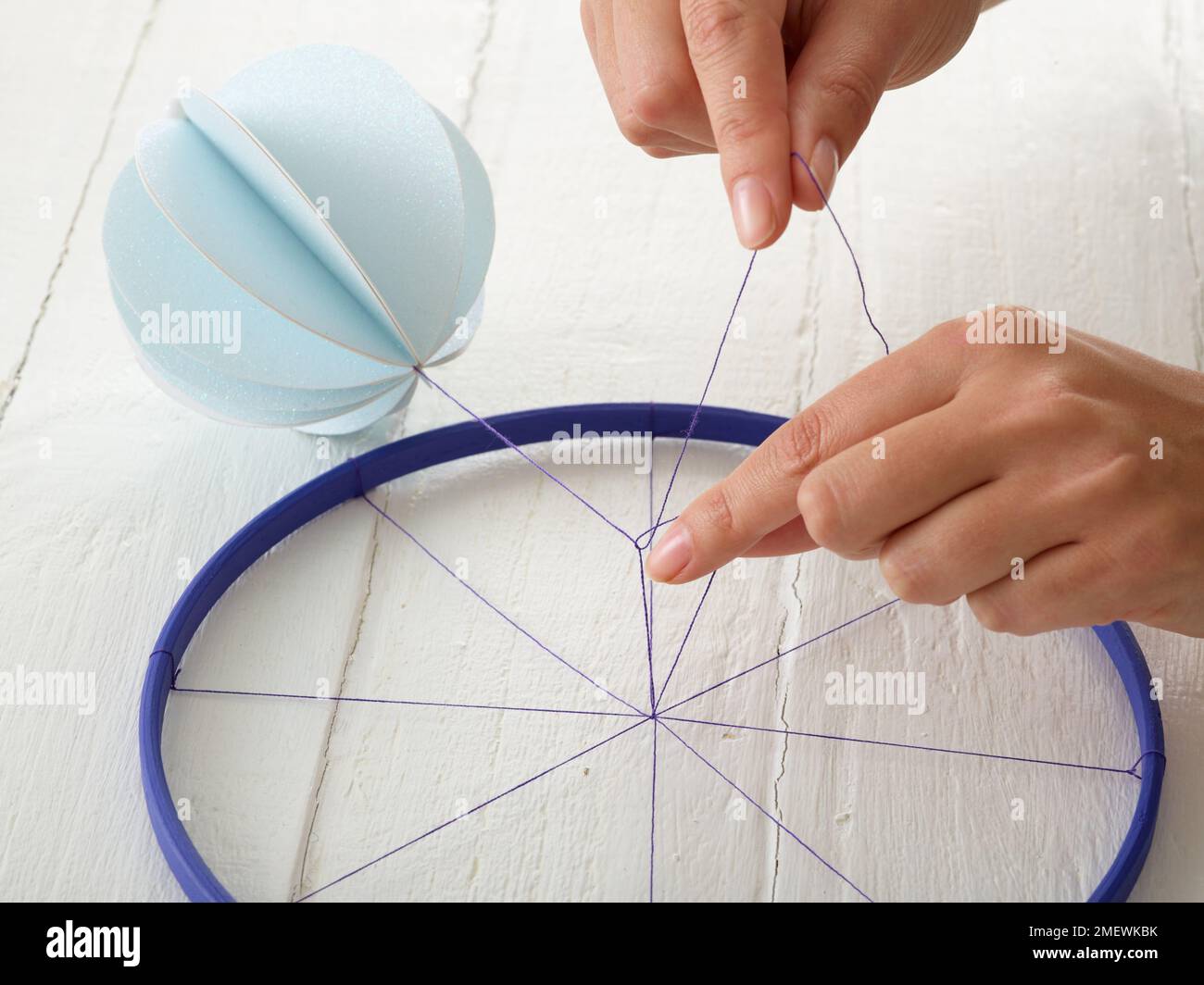 Paper Craft. DIY Paper Mobile Step 21 Stock Photo - Alamy