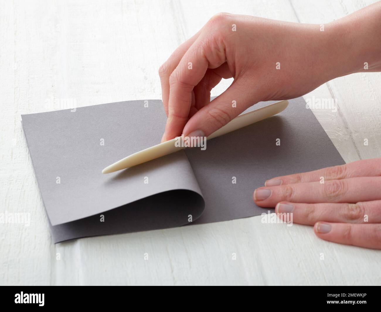 Paper Craft. DIY Concertina City Card Step 3 Stock Photo - Alamy