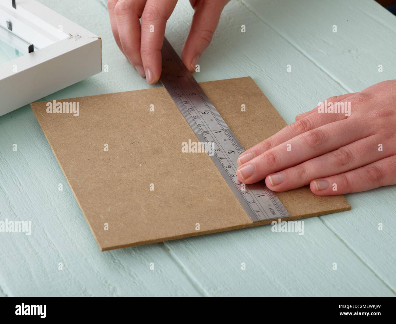 Paper Craft, DIY Paper Cut Frame Step 6 Stock Photo - Alamy