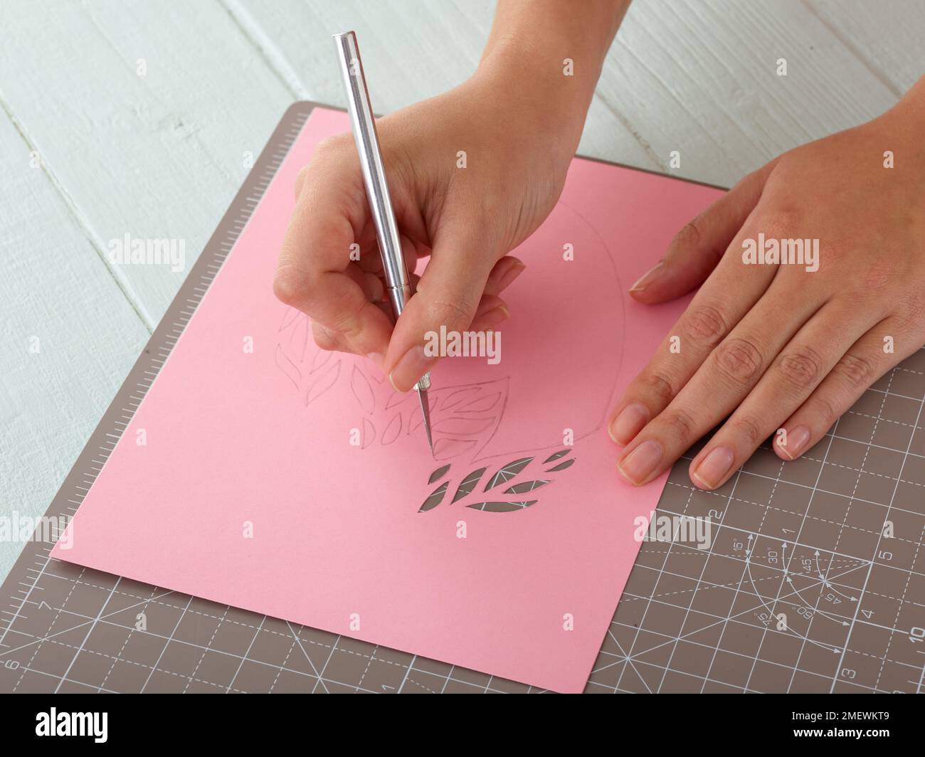 Paper Craft. DIY Layered Paper Cut Frame Step 3 Stock Photo - Alamy