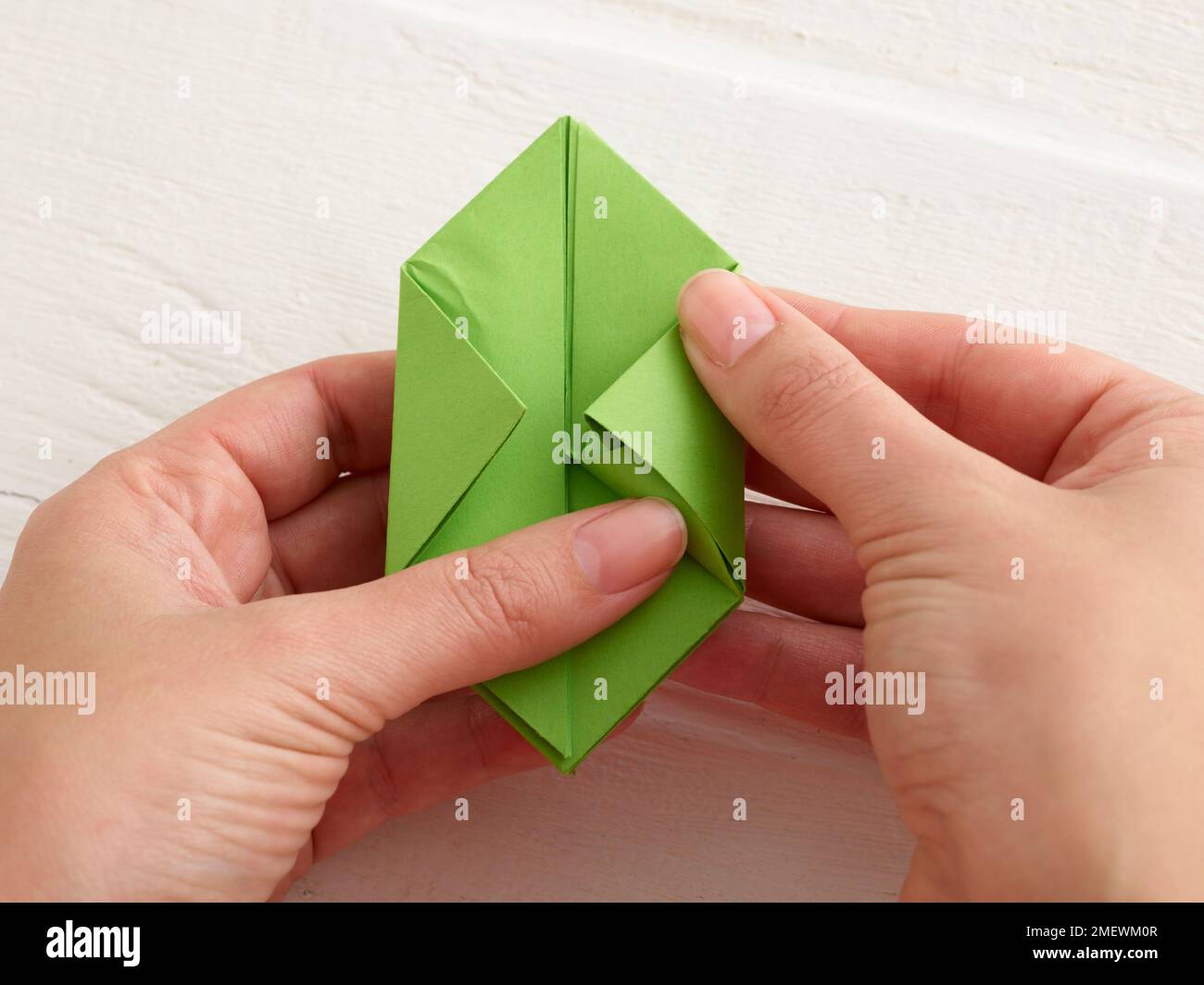 Paper Craft. DIY Origami Fairy Lights Step 12 Stock Photo - Alamy
