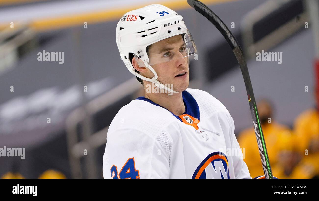 New York Islanders' Thomas Hickey (34) plays in an NHL hockey game ...