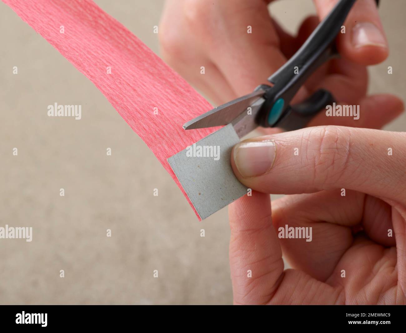 Papercraft. DIY Paper Blossom, cutting crepe paper to size for center ...