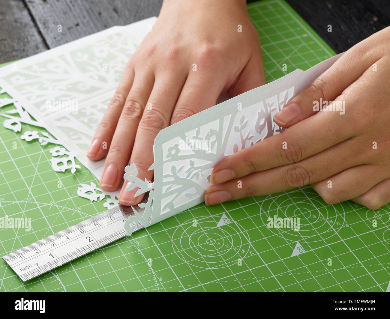 Papercraft. DIY Paper Lantern, creating fold line using ruler Stock ...