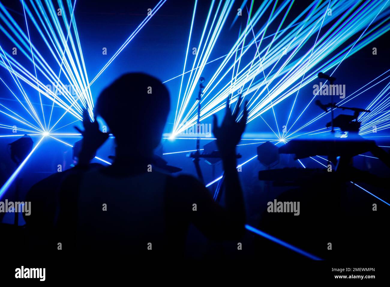 Amazing light laser show on the event party Stock Photo - Alamy