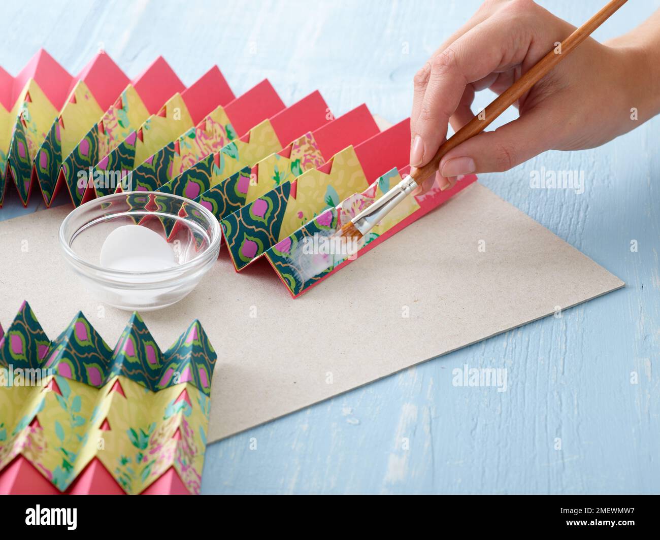 Papercraft Paper fan step 8 Stock Photo - Alamy