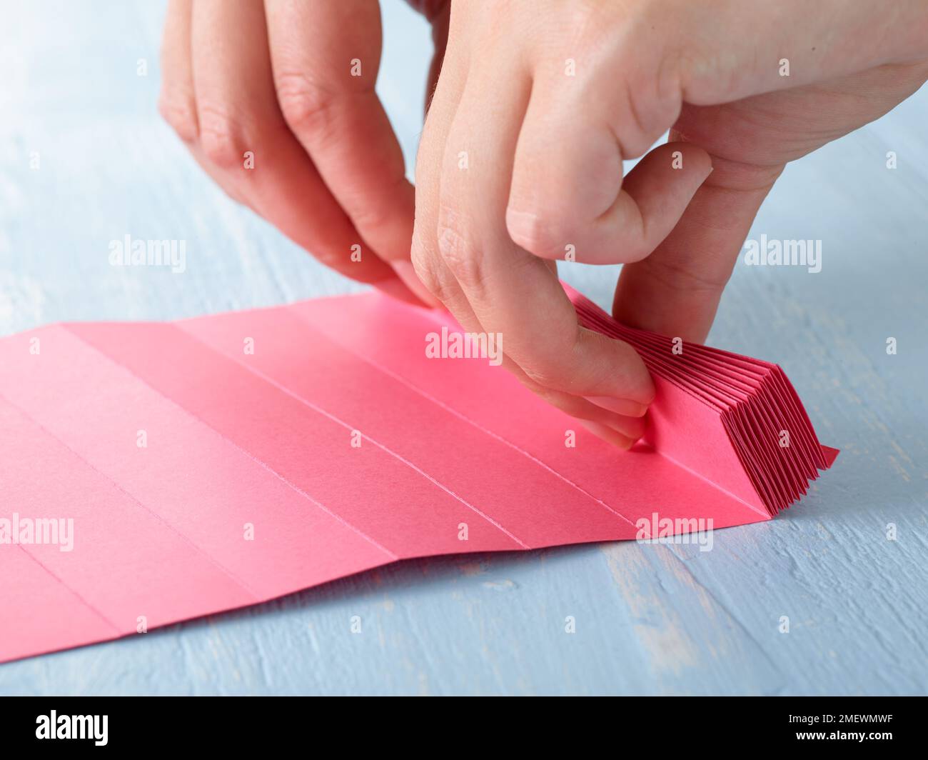 Papercraft Paper fan step 3 Stock Photo - Alamy
