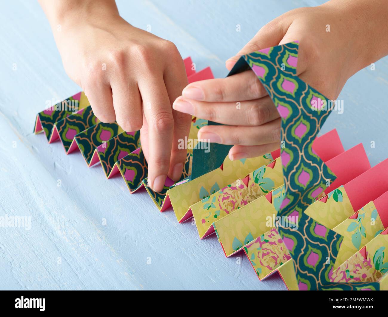 Papercraft Paper fan step 7 Stock Photo - Alamy