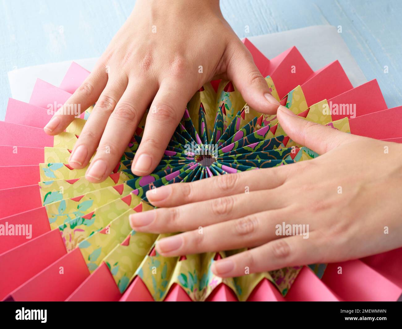Papercraft Paper fan step 10 Stock Photo - Alamy