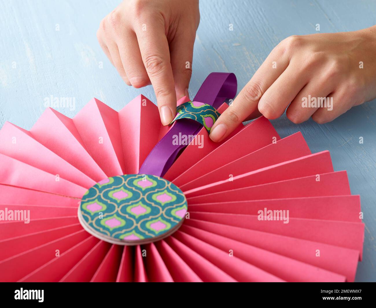 Folded paper fan hi-res stock photography and images - Alamy