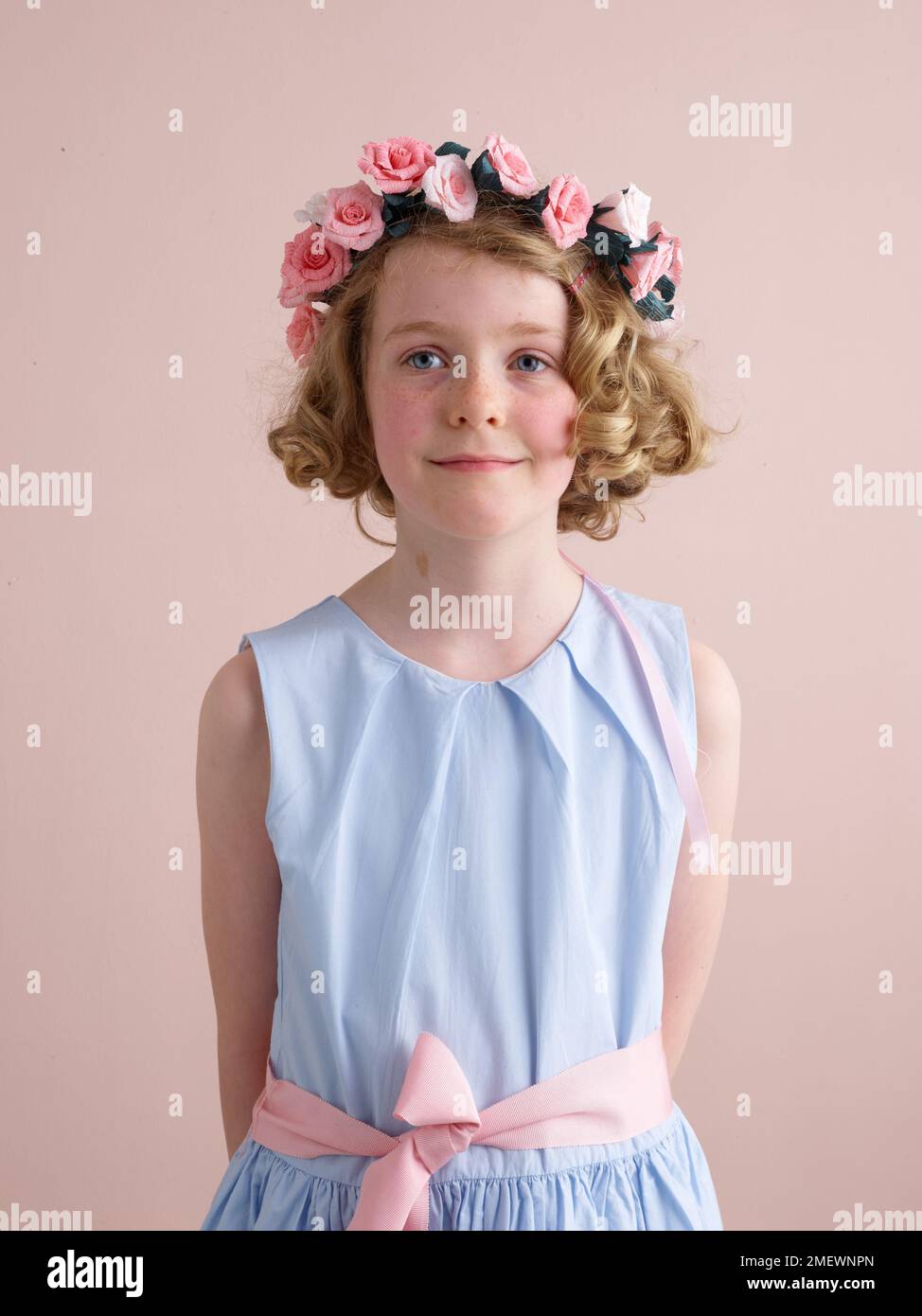 Papercraft Giant rose beauty shot hair garland Stock Photo - Alamy