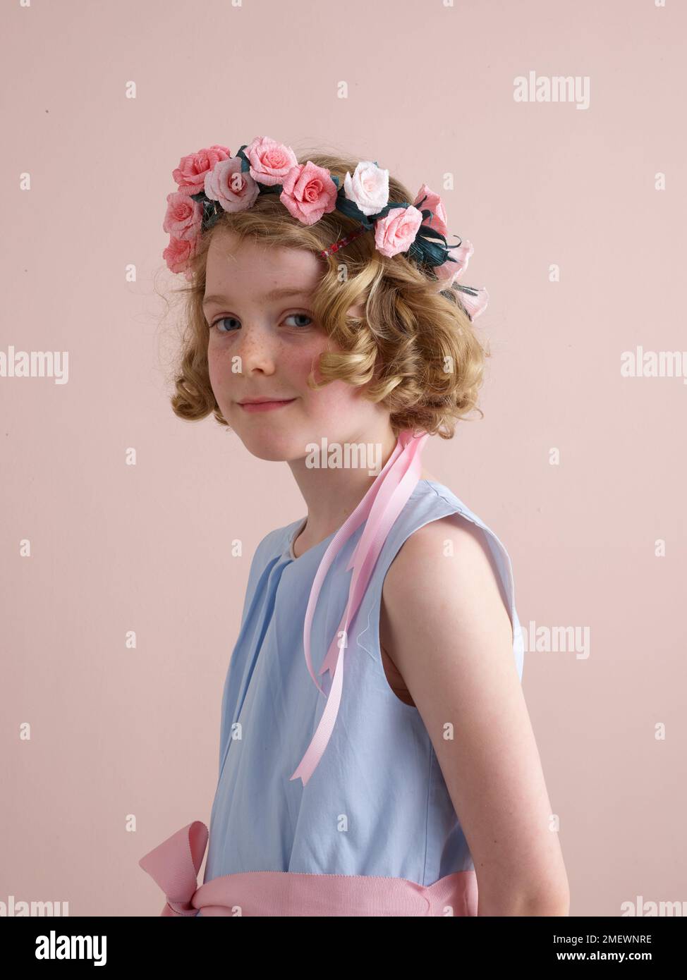 Papercraft Giant rose beauty shot hair garland Stock Photo - Alamy