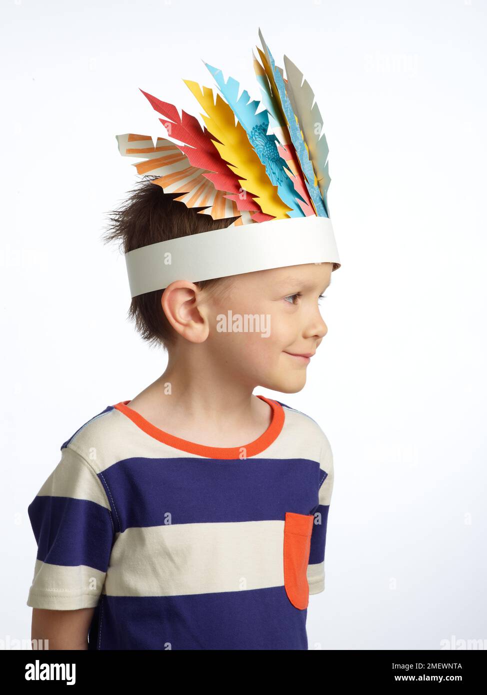 Papercraft Paper crowns Boy in feather headdress Stock Photo - Alamy