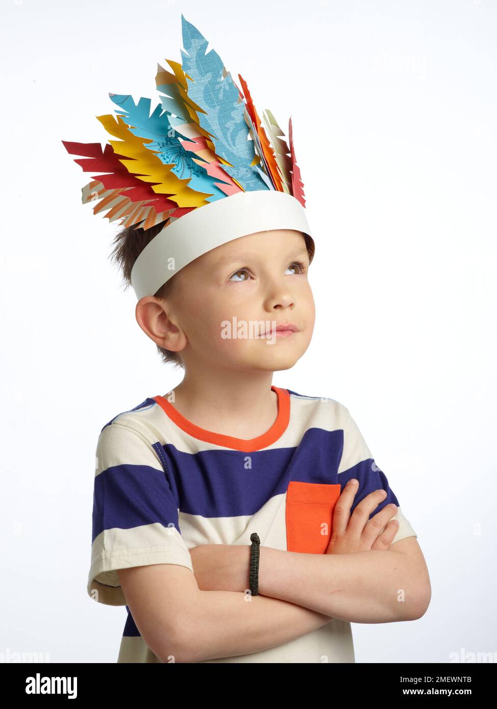 Papercraft Paper crowns Boy in feather headdress Stock Photo - Alamy