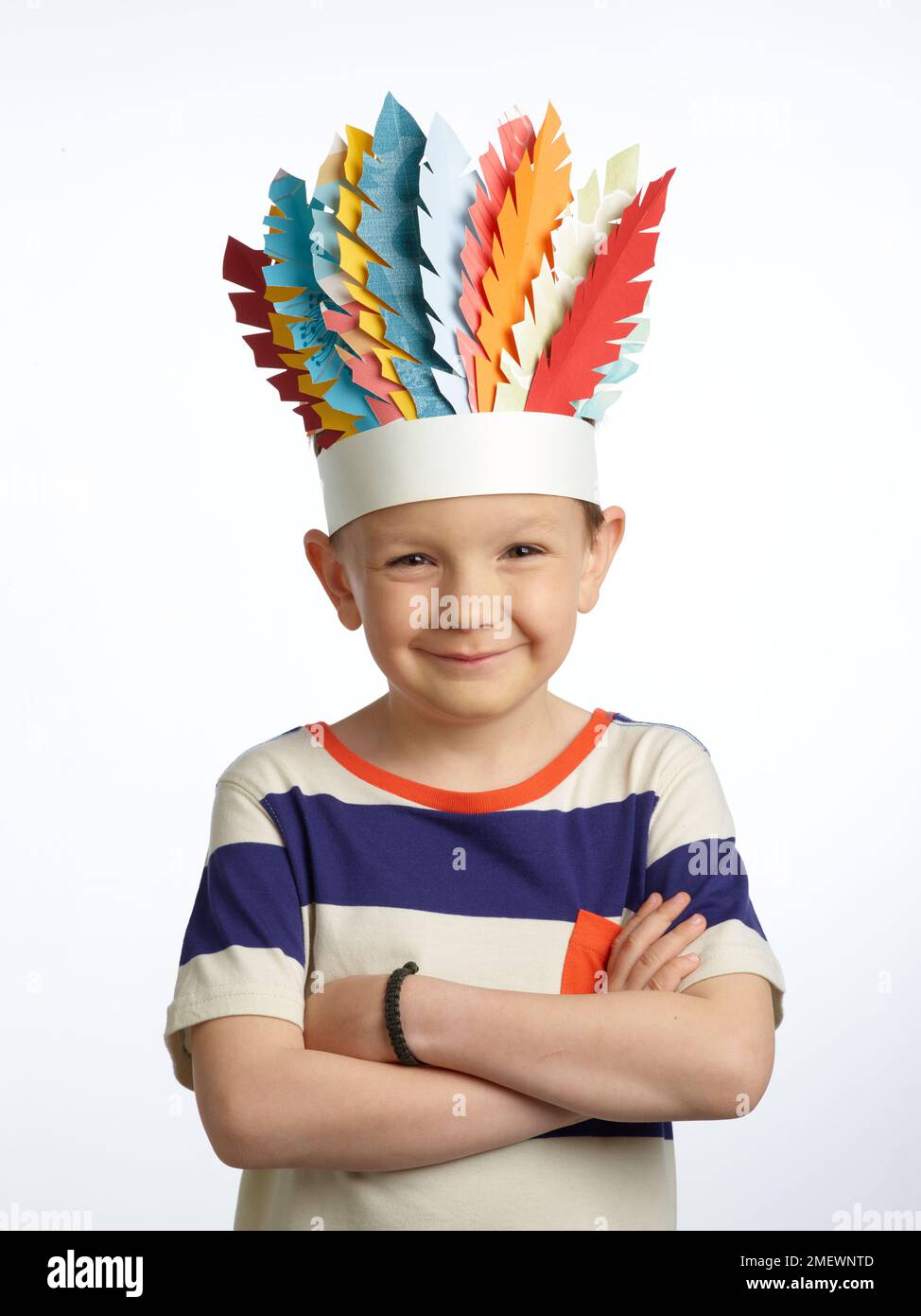 Papercraft Paper crowns Boy in feather headdress Stock Photo - Alamy