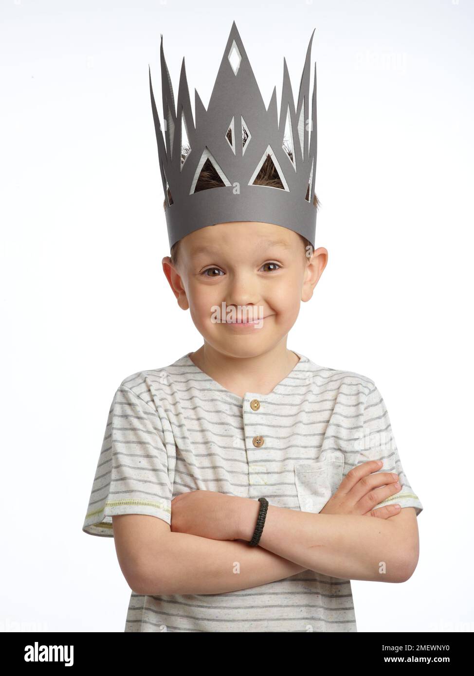 Papercraft Paper crowns Boy in abstract king crown Stock Photo - Alamy