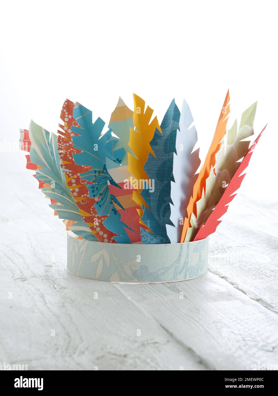 Papercraft Paper crowns Feathers Stock Photo - Alamy