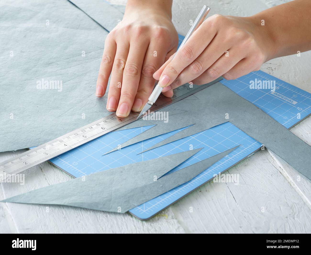 Papercraft Paper crown steps Stock Photo - Alamy