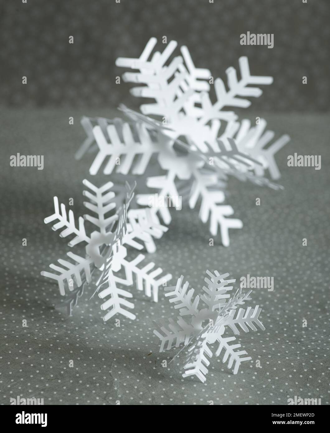 Papercraft snowflake baubles Stock Photo - Alamy