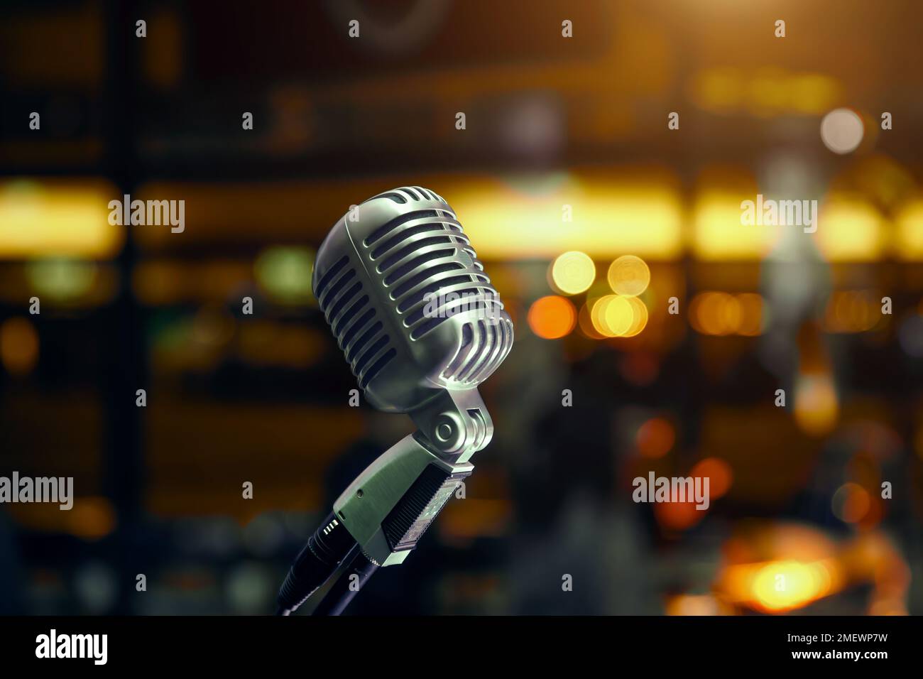 Retro microphone on the stage. Mic and blurred festive bokeh Stock ...
