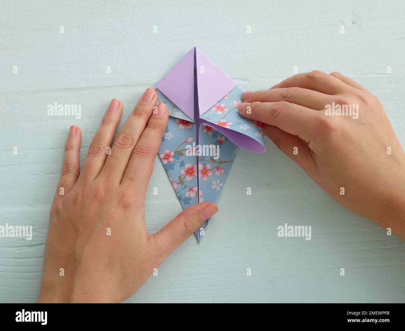 Papercraft origami birds steps Stock Photo - Alamy