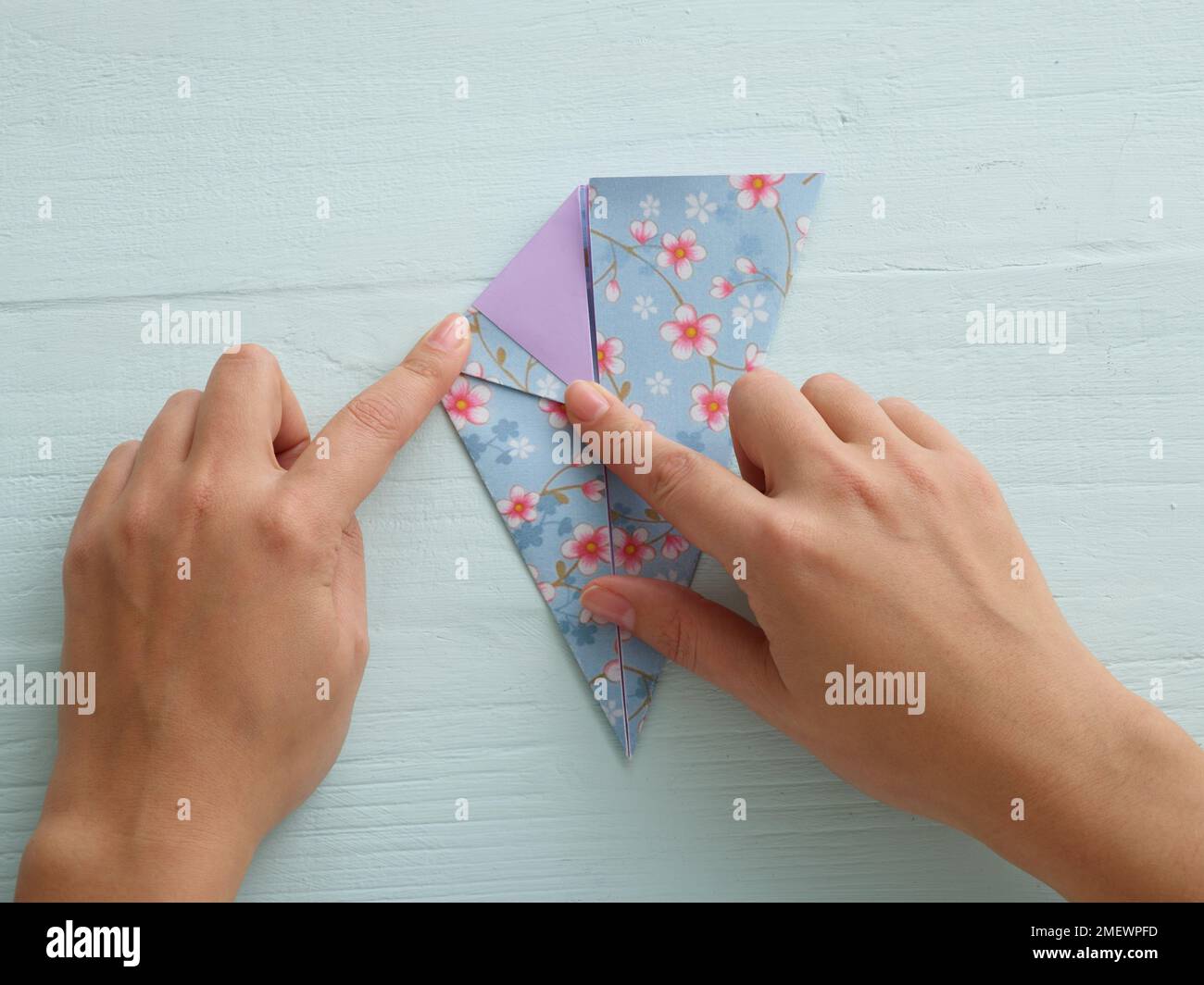 Papercraft origami birds steps Stock Photo - Alamy