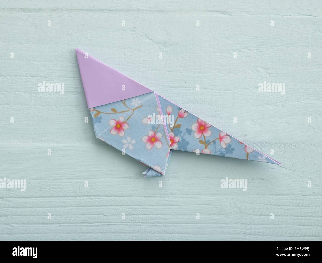 Papercraft origami birds steps Stock Photo - Alamy