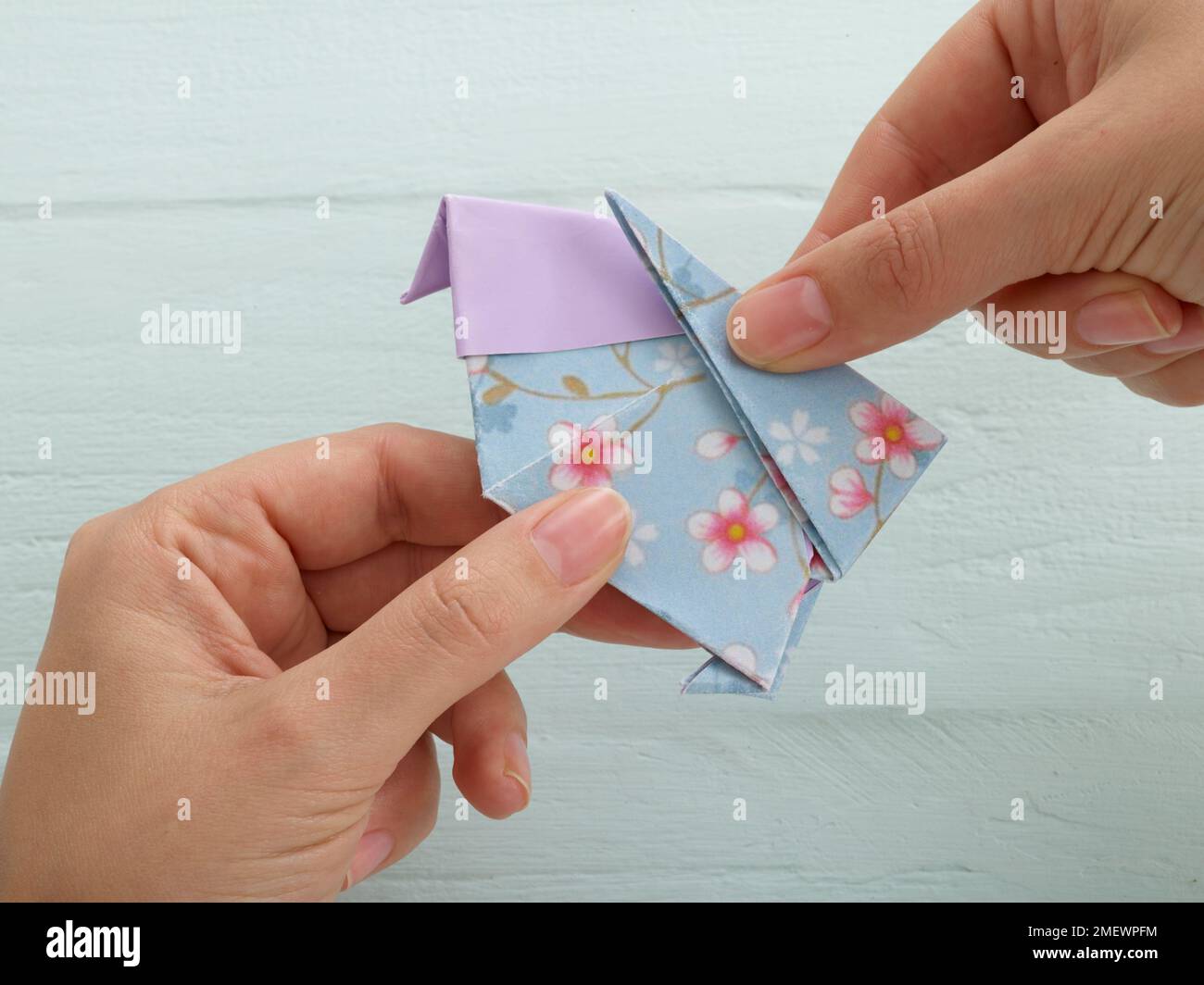 Papercraft origami birds steps Stock Photo - Alamy