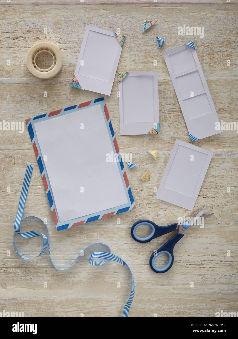 Papercraft. DIY Frames and map and ribbon photo corners with tools ...