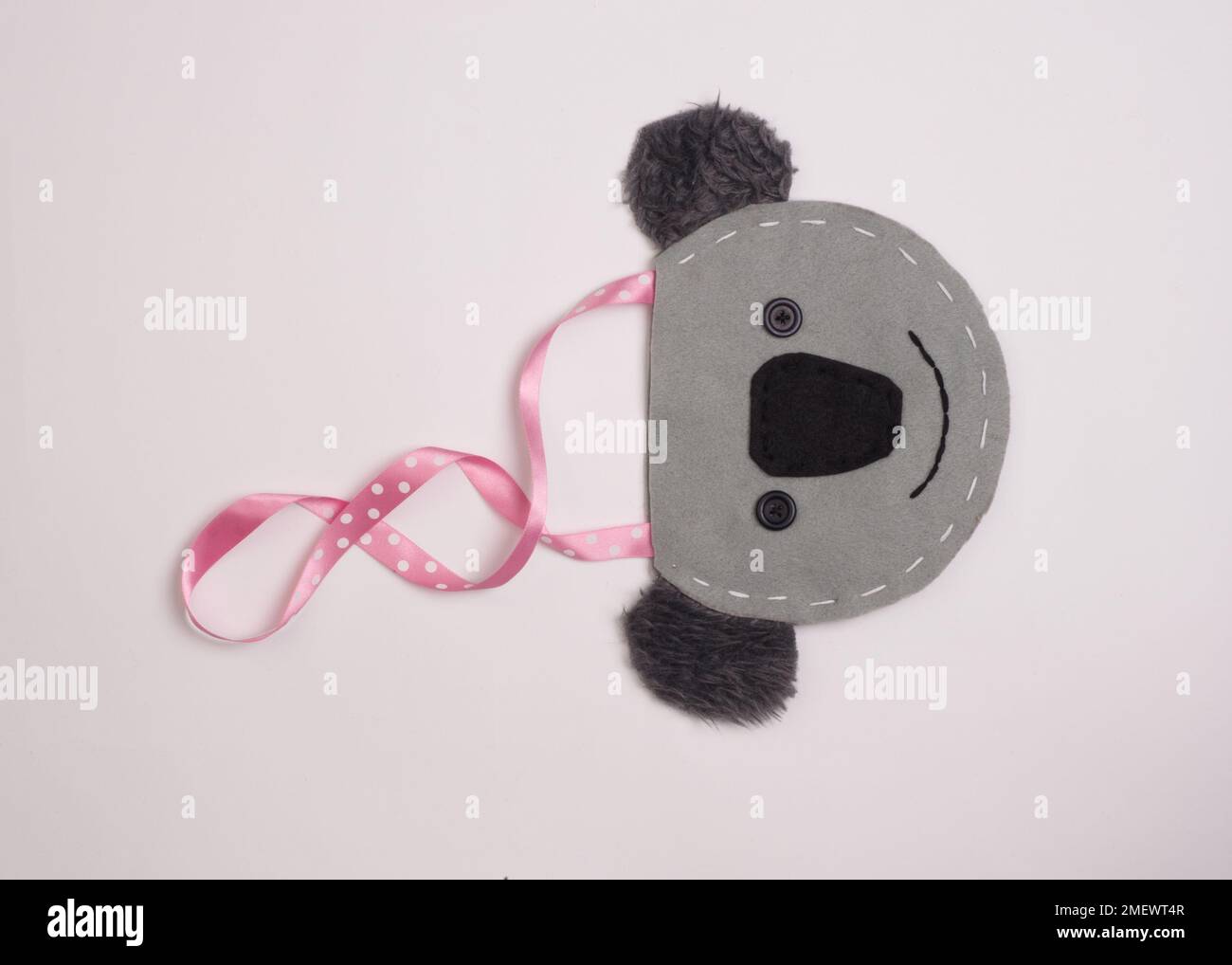 Koala bag made from felt with ribbon handle Stock Photo - Alamy