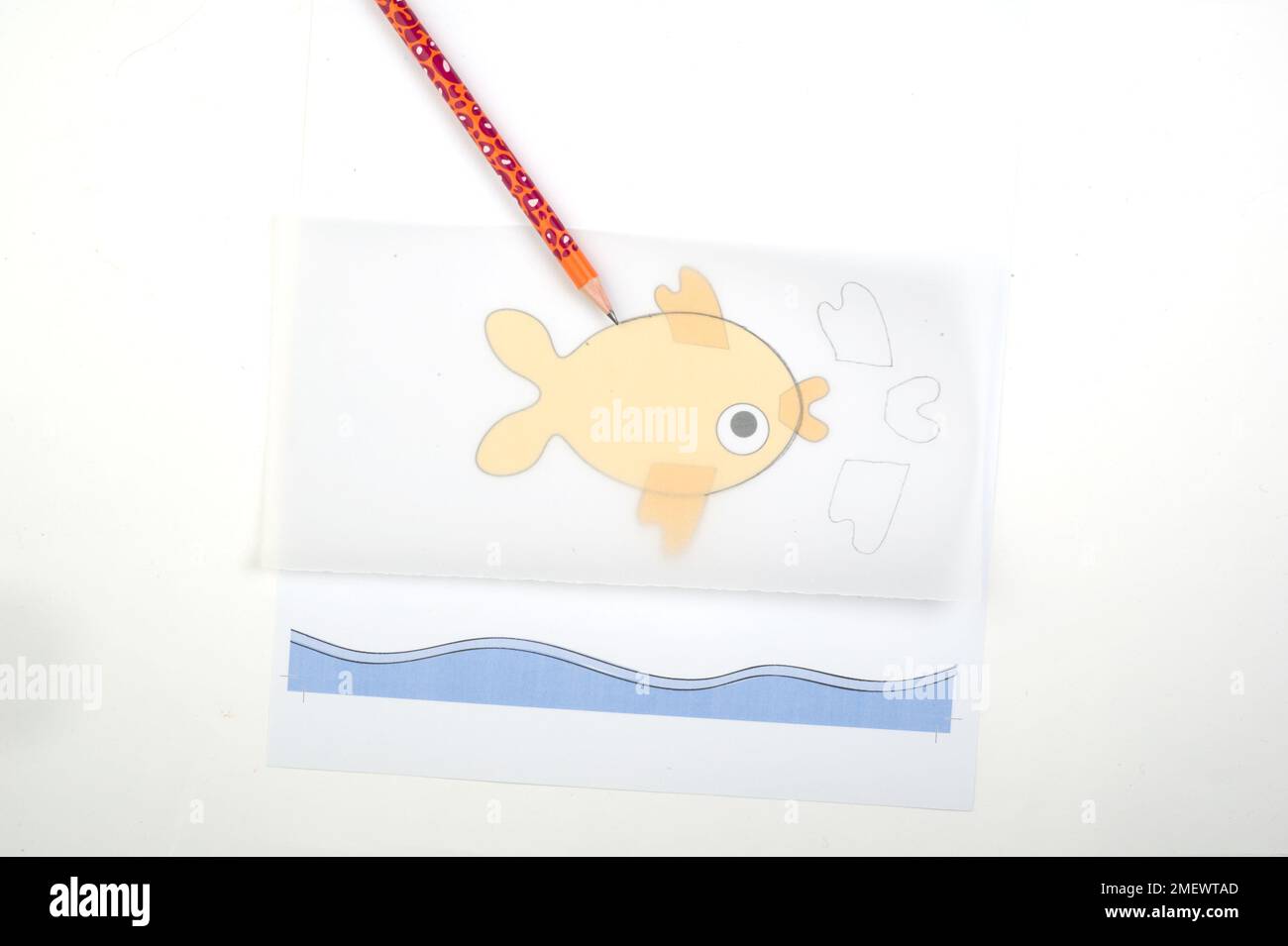 Tracing template onto thin paper Stock Photo - Alamy