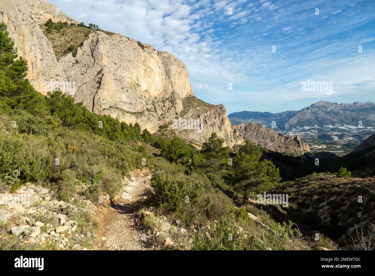 walking route PR CV 017 underneath the cliffs of Penyo Cabal Mountain ...