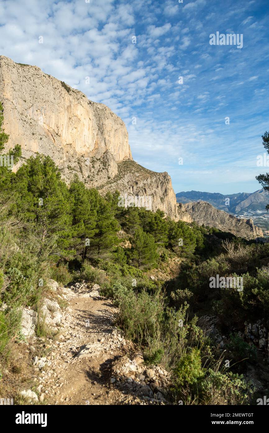 walking route PR CV 017 underneath the cliffs of Penyo Cabal Mountain ...