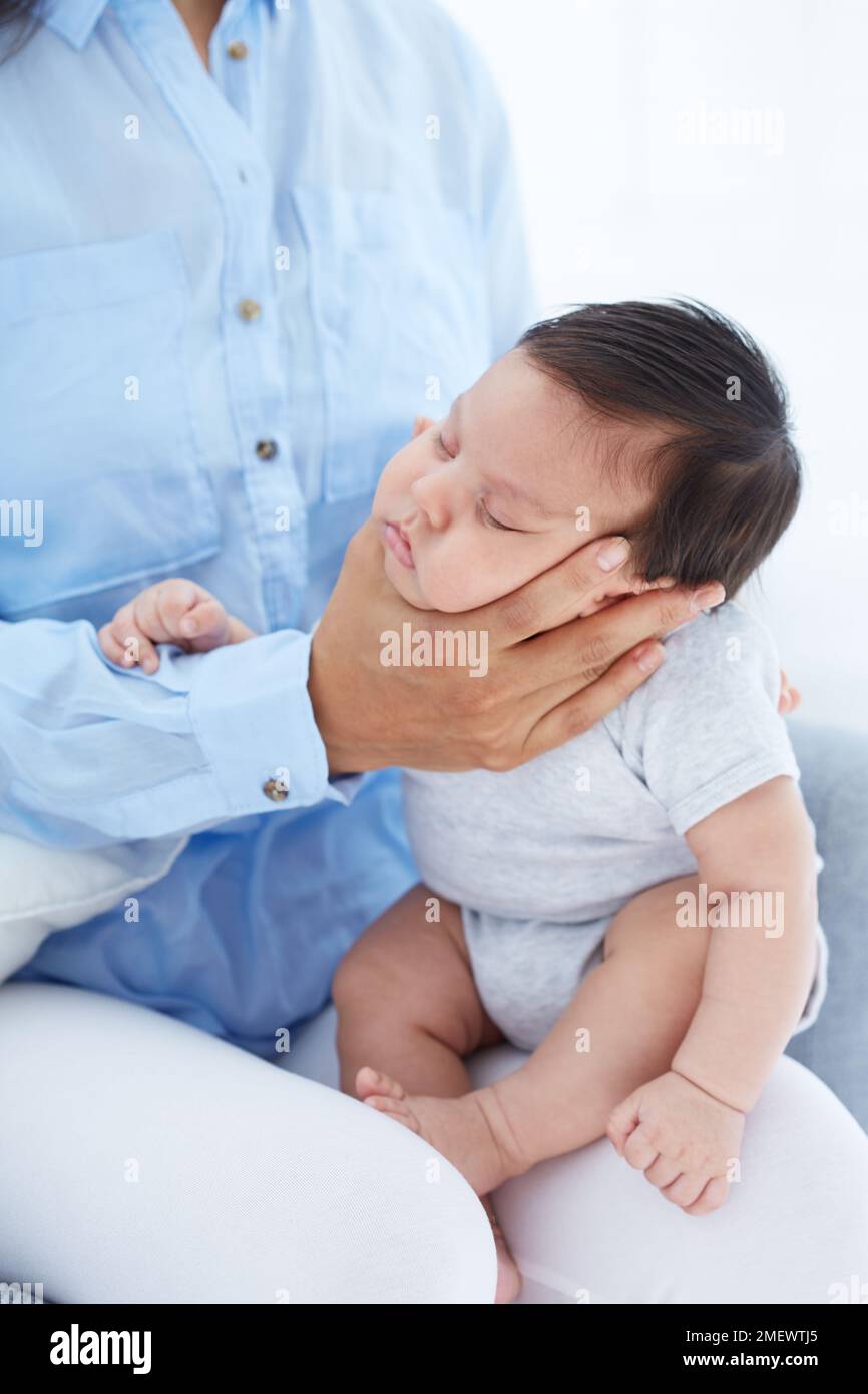 Winding positions, baby sitting upright. 7 weeks Stock Photo - Alamy