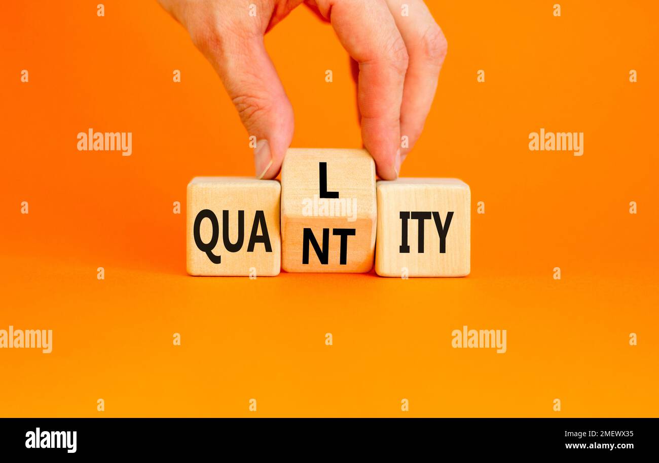 Quality and quantity symbol. Concept word Quality Quantity on wooden ...