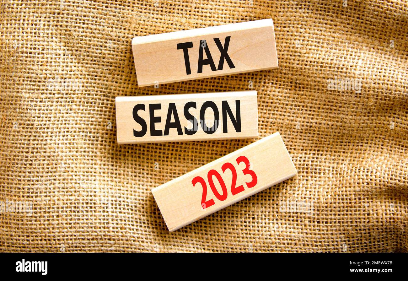 Tax season 2023 symbol. Concept words Tax season 2023 on wooden blocks ...