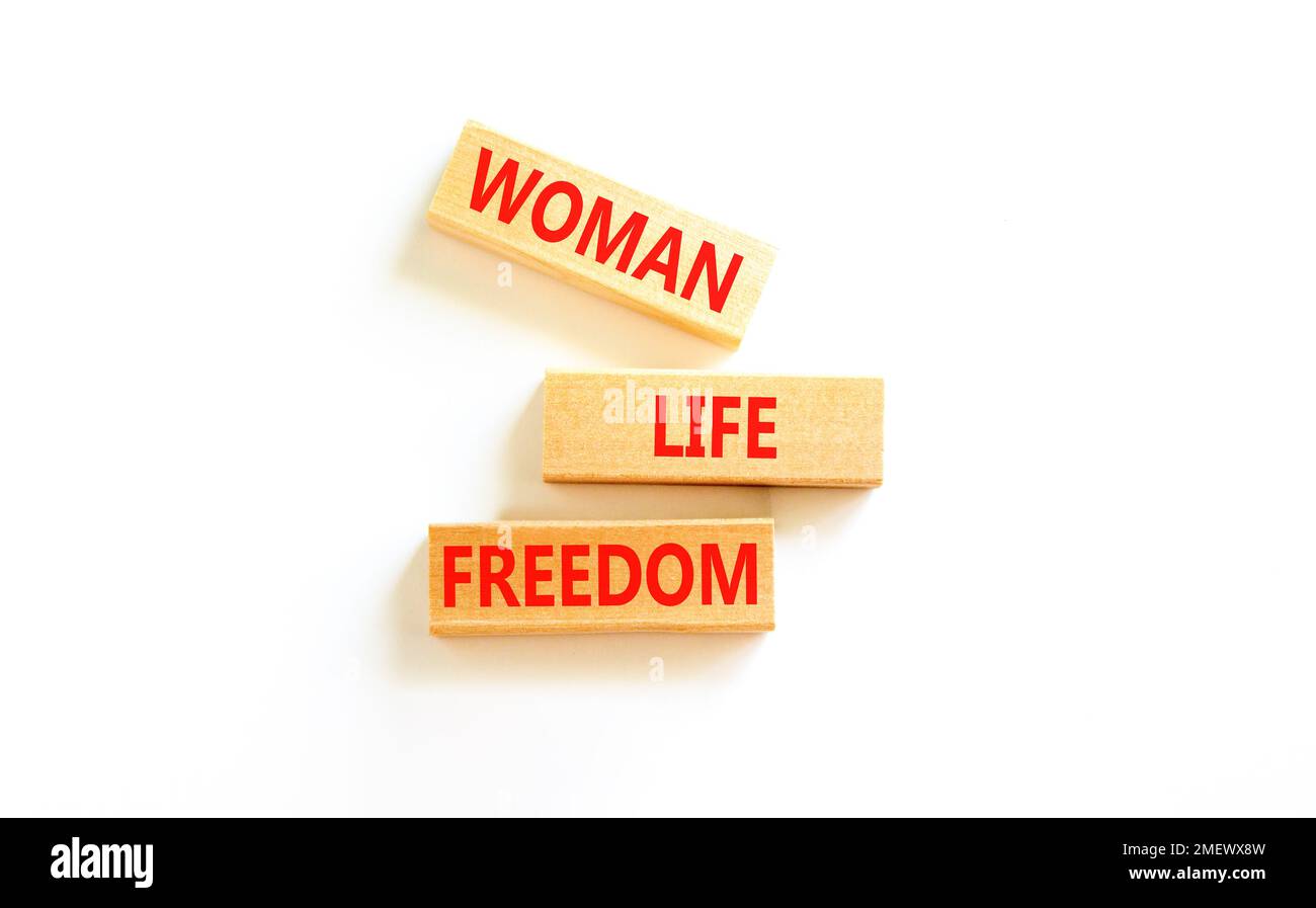 Woman life freedom symbol. Concept words Woman Life Freedom on wooden ...