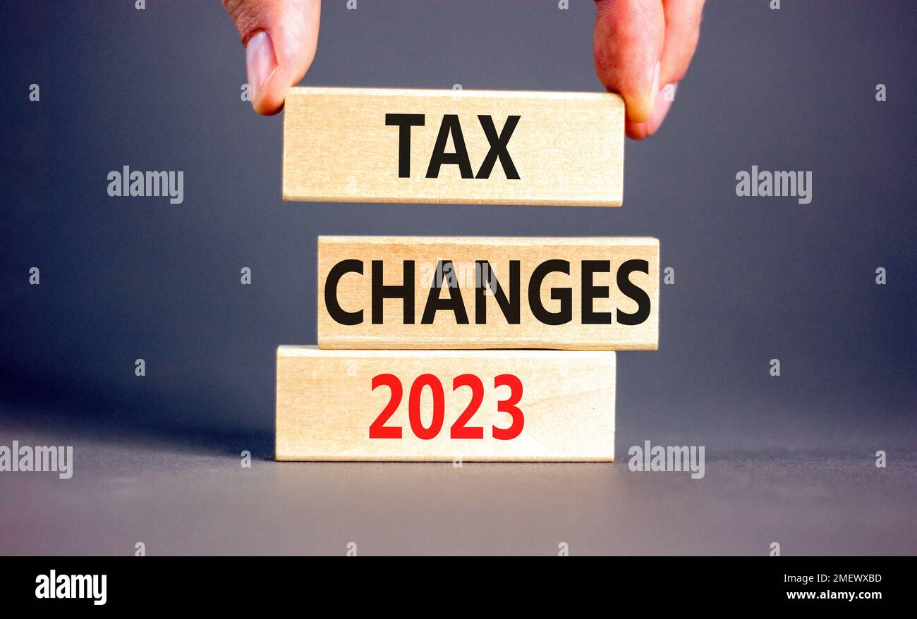 Tax changes 2023 symbol. Concept words Tax changes 2023 on wooden ...