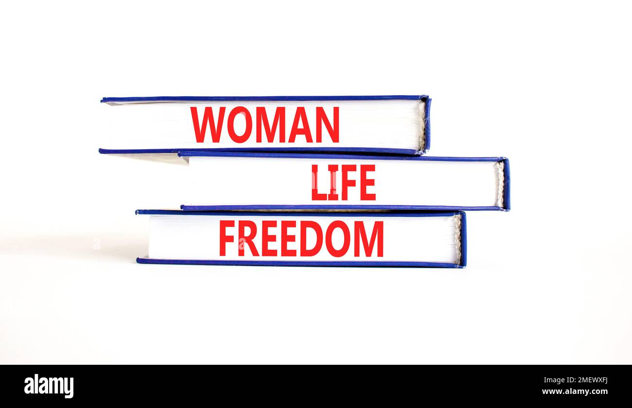 Woman life freedom symbol. Concept words Woman Life Freedom on books on ...