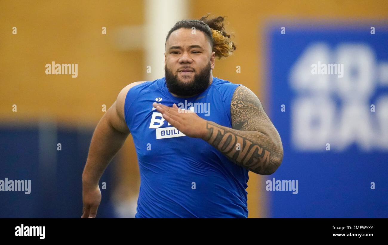 BYU defensive lineman Khyiris Tonga runs the 40-yard dash in the school ...