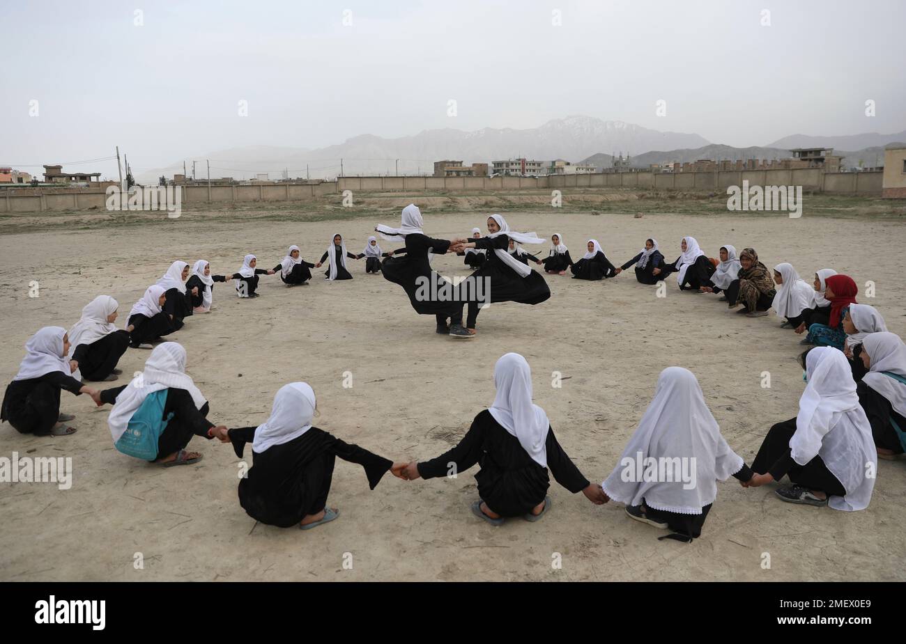Afghan students play in a primary school in Kabul, Afghanistan ...