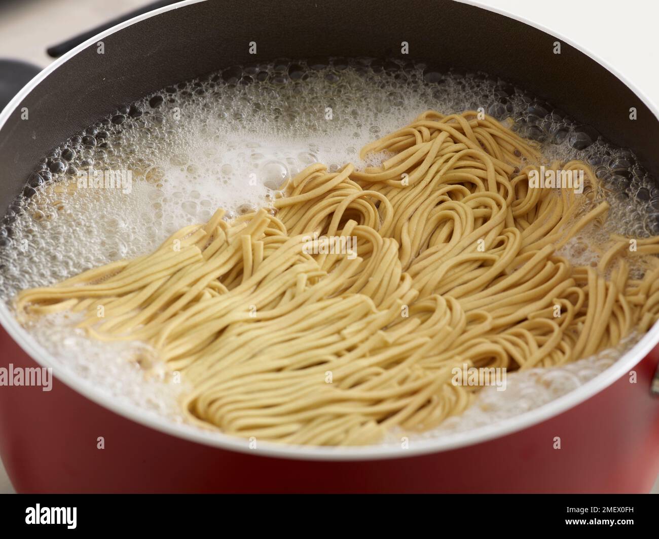 steps for vegetable chow mein, step 1 Stock Photo - Alamy