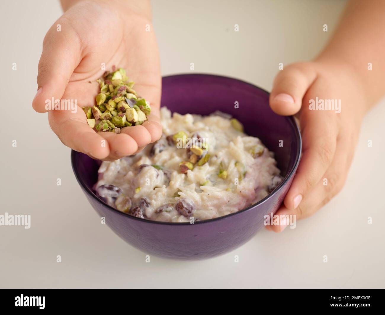 steps for indian rice pudding, step 5 Stock Photo - Alamy