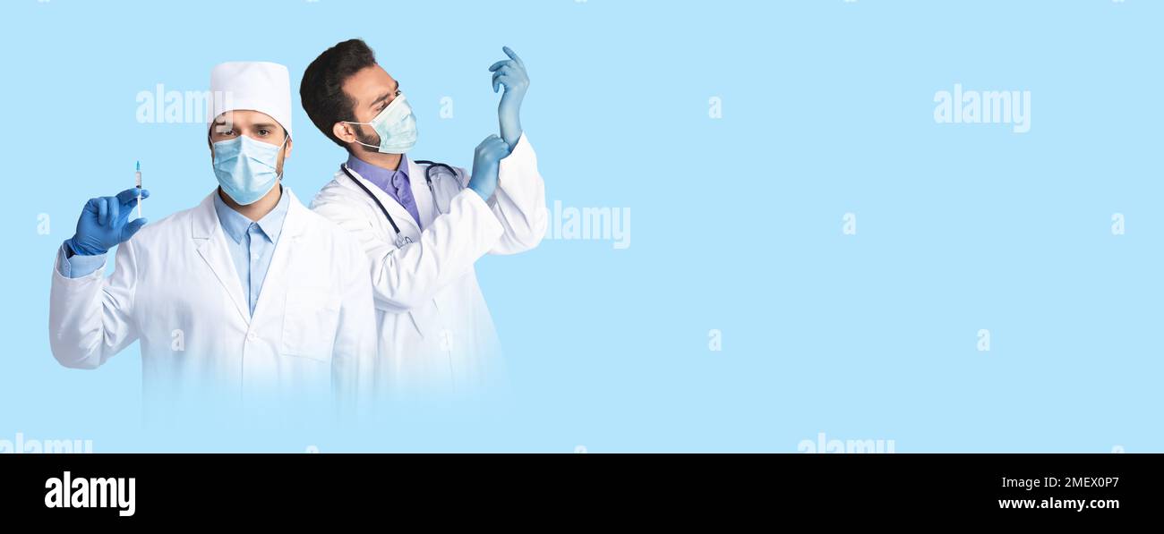 Multiracial medical team getting ready bafore surgery, blue background ...