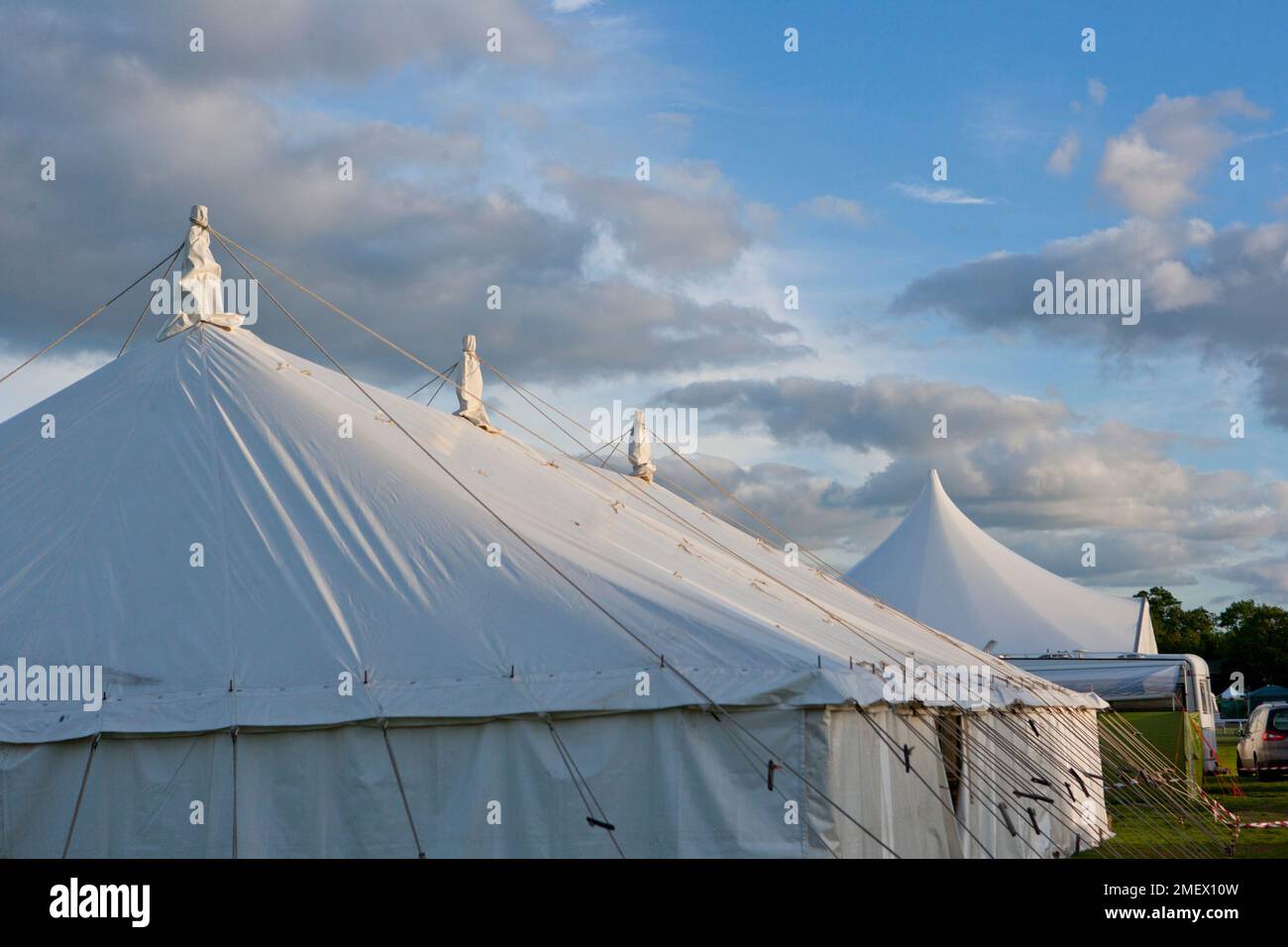 White tent at a village fair Stock Photo - Alamy
